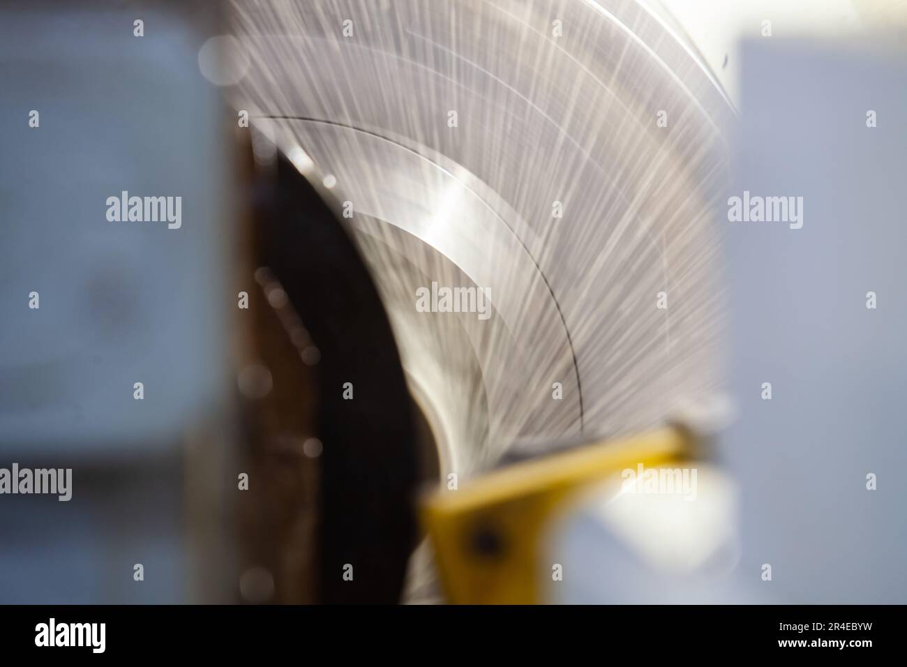 Machining pipe on turning lathe. Water cooling of tool. Closeup photo ...