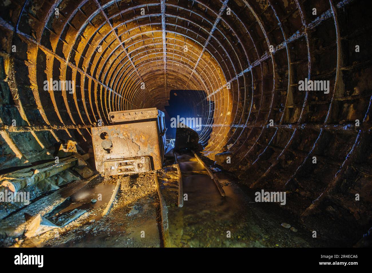 Old abandoned subway tunnel with rusty trolley Stock Photo - Alamy