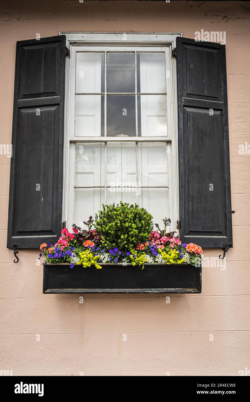 Close up of the color windows of a colonial era home in Charleston ...