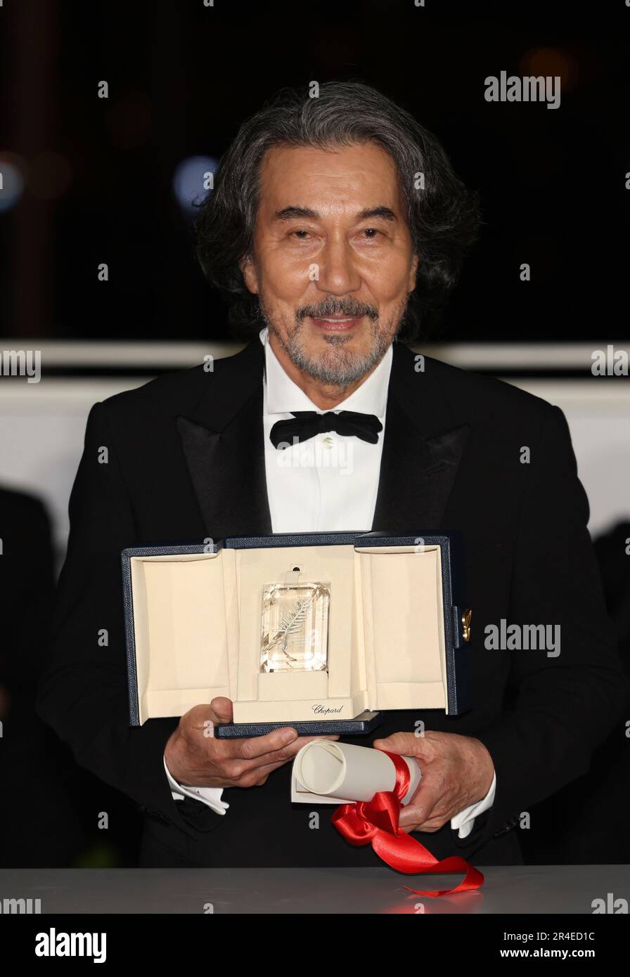 Koji Yakusho, winner of the award for best actor for 'Perfect Days', poses for photographers ...