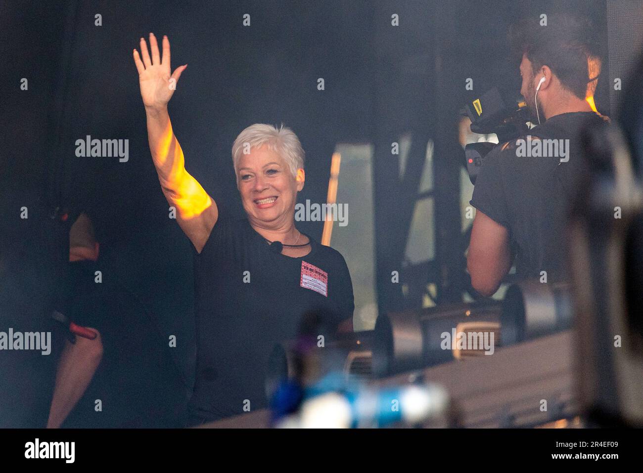 Denise Welch waves to fans as The 1975 perform on the main stage during ...