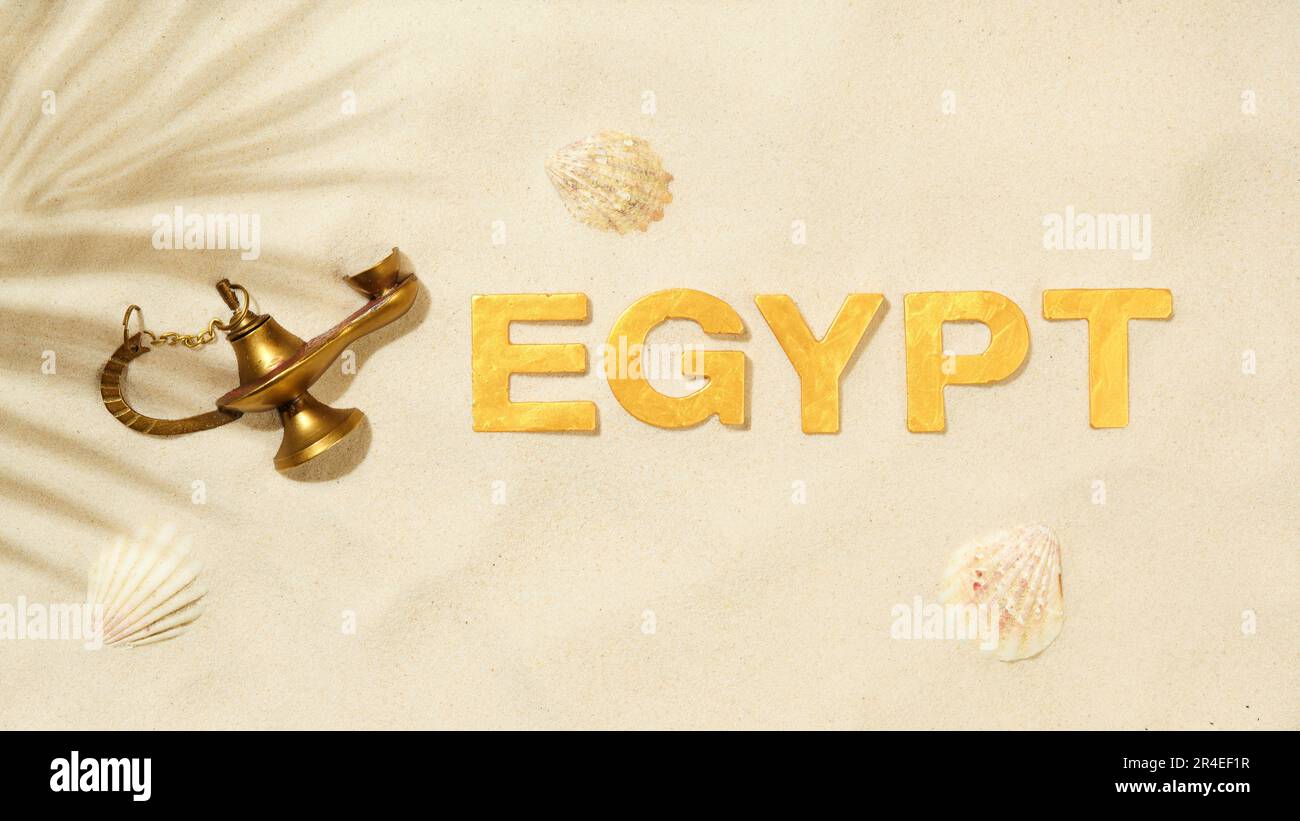 Egypt - Text and old magical oil lamp in the sand Stock Photo - Alamy