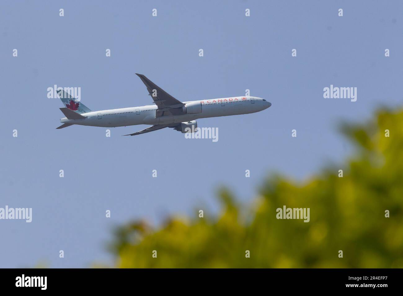 London, UK. 27th May, 2023. An Air Canada Boeing B777 aircraft takes ...
