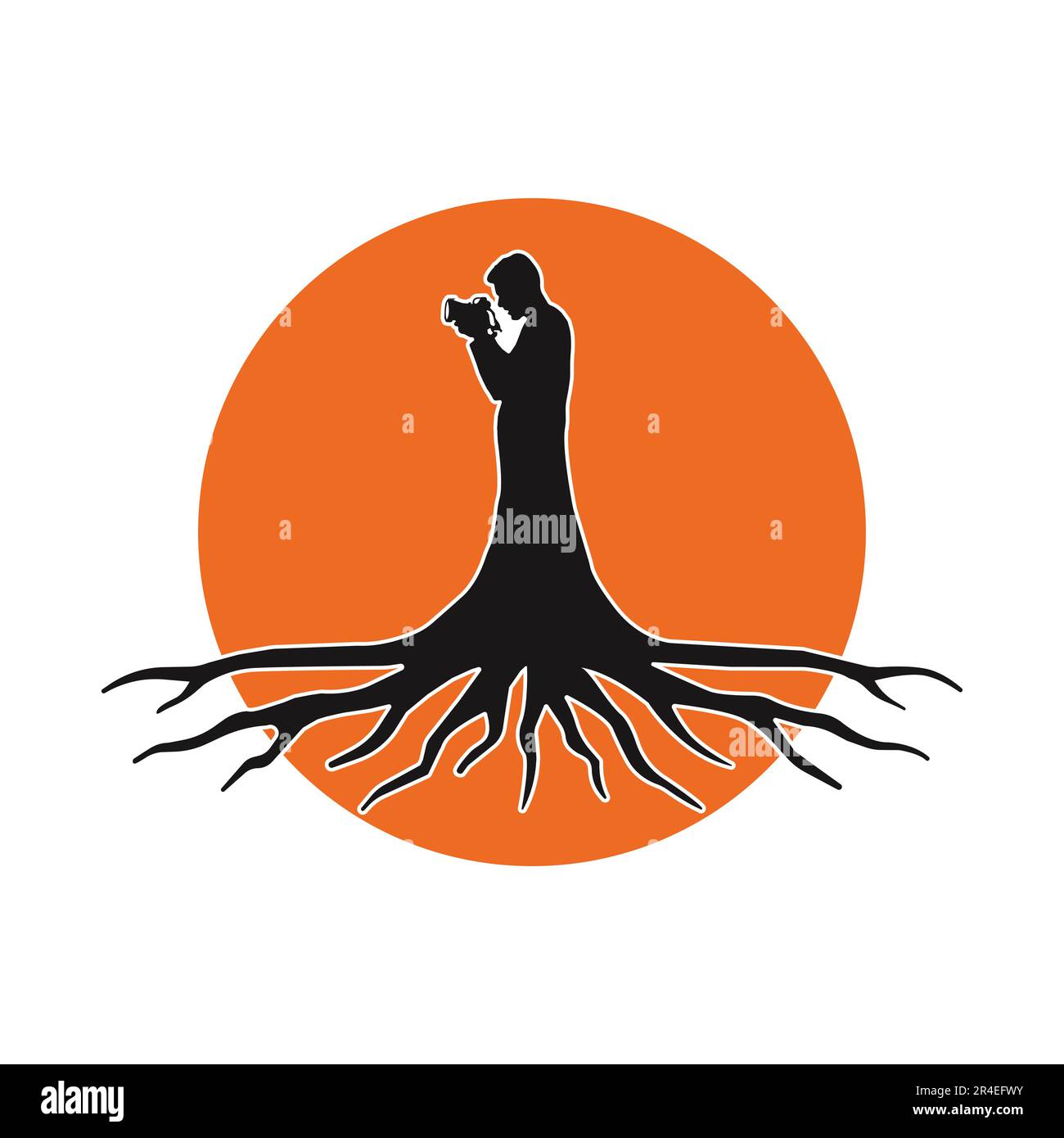 Silhouette of a photographer with Roots and camera on the background of ...