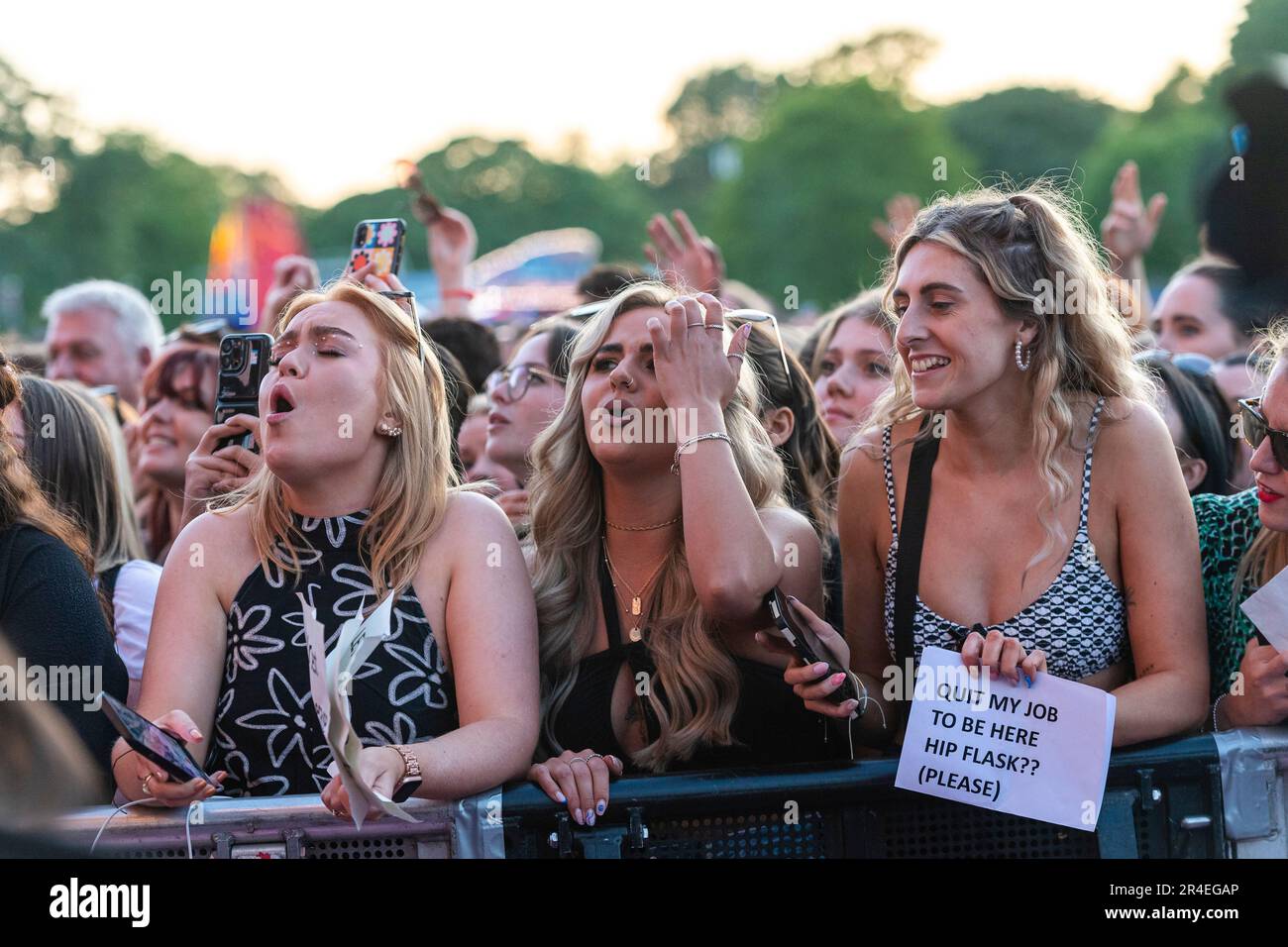 Fans watch The 1975 performing on the main stage during BBC Radio 1's ...