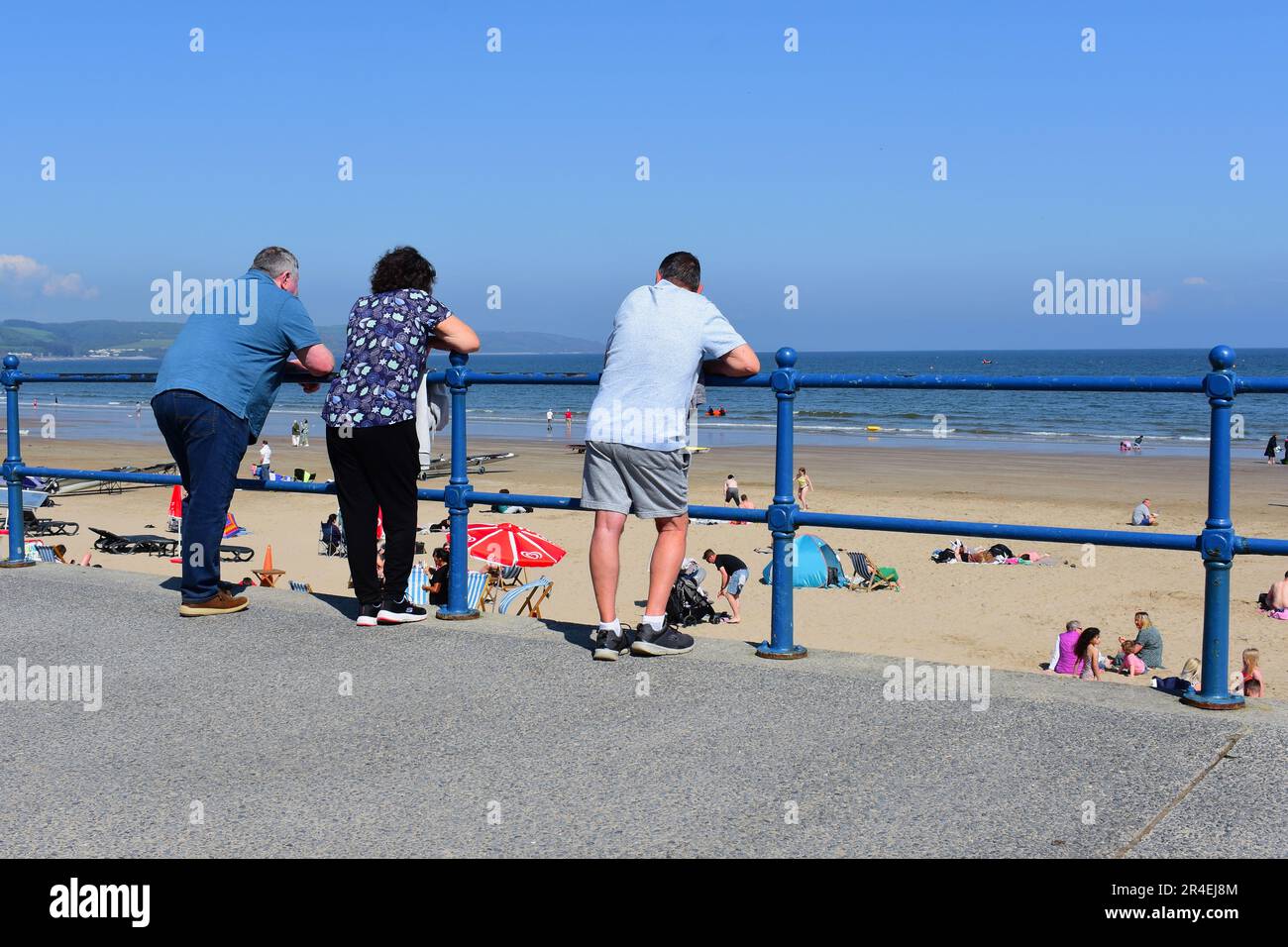A typical busy British seaside holiday scene at the beach in summer ...