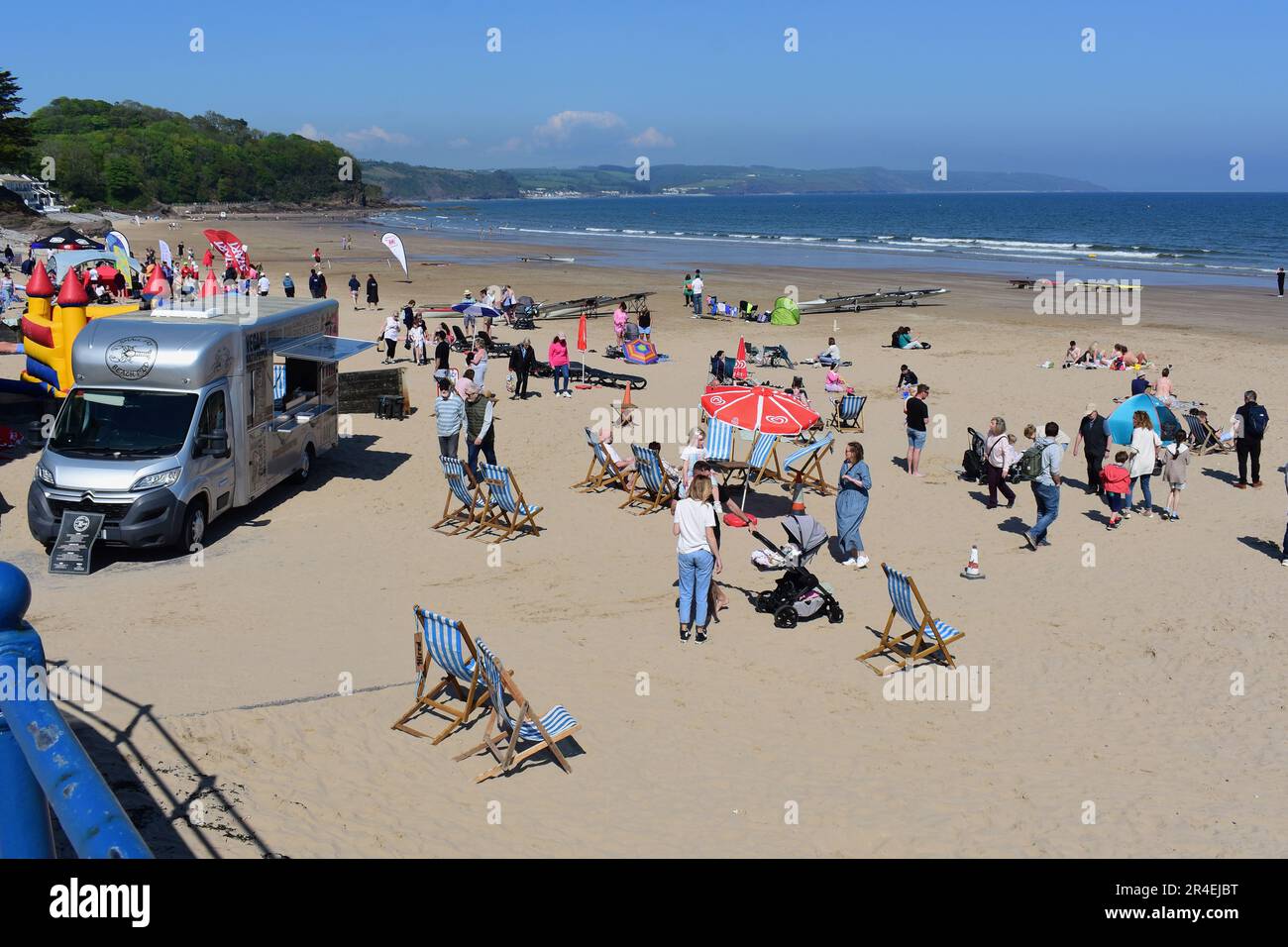 A typical busy British seaside holiday scene at the beach in summer in ...