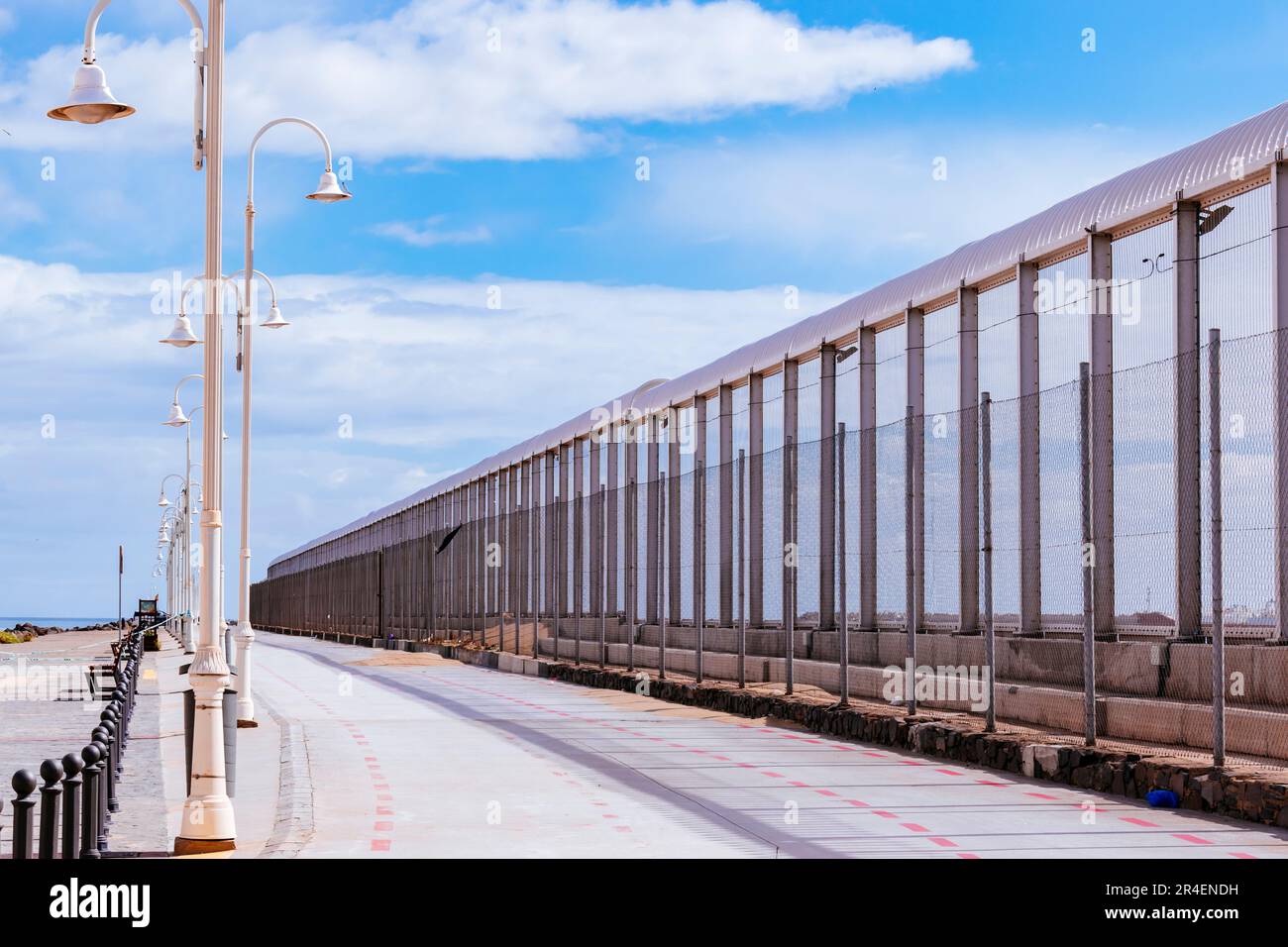 Fence that separates the city of Melilla from the Moroccan port of ...