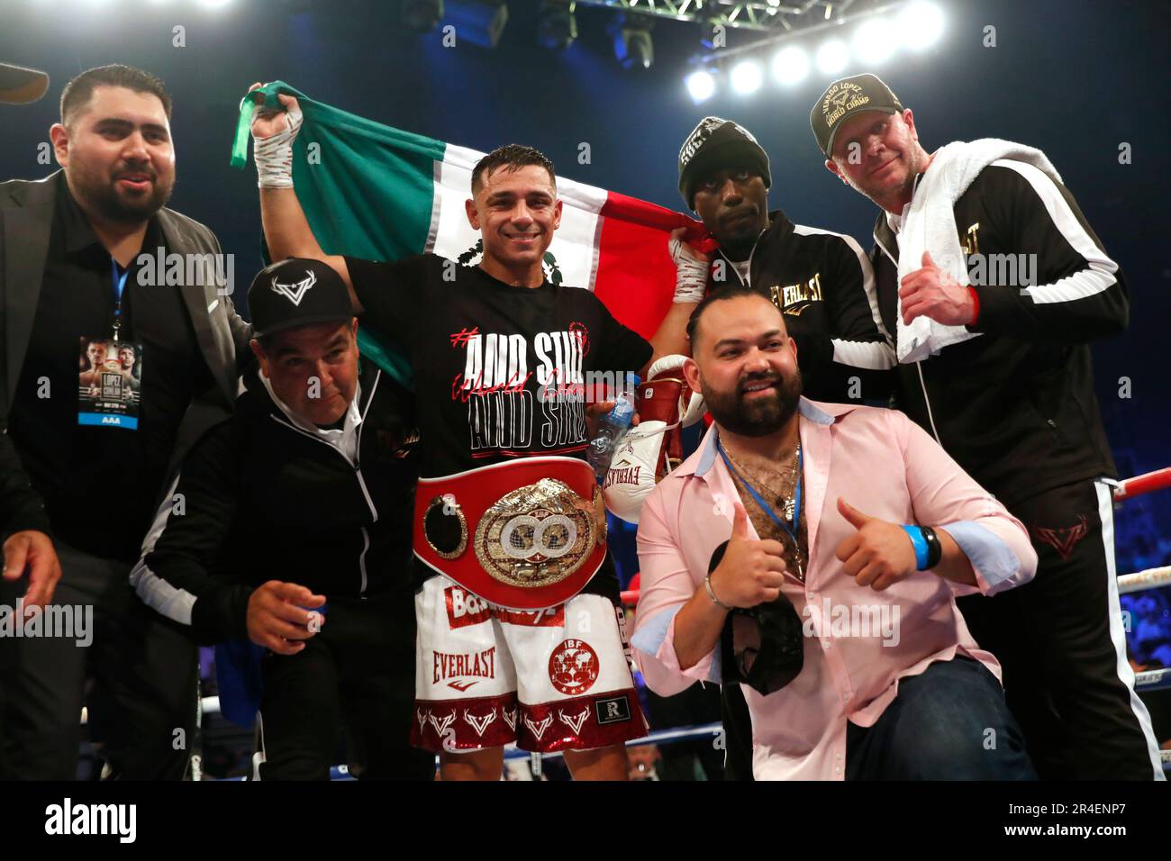 Luis Alberto Lopez poses with his team after defeating Michael Conlan ...