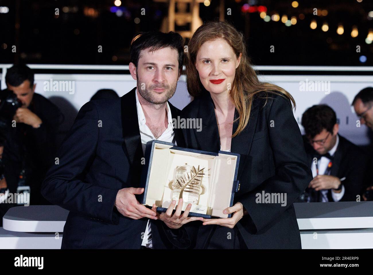 Cannes, France. 27th May, 2023. Arthur Harari and Justine Triet pose ...
