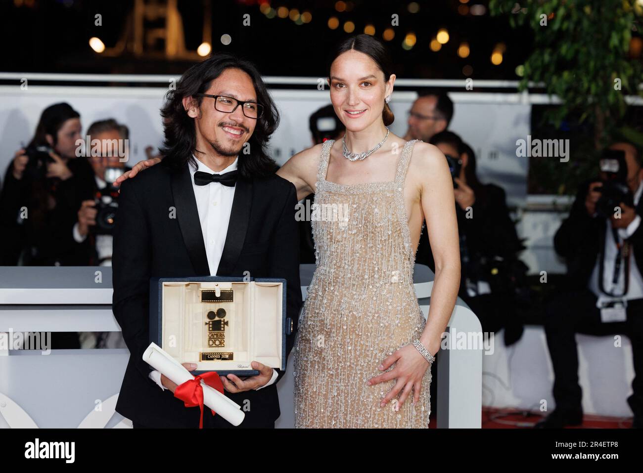 Cannes, France. 27th May, 2023. Director Pham Thien An poses with The Caméra d'or Award for ...