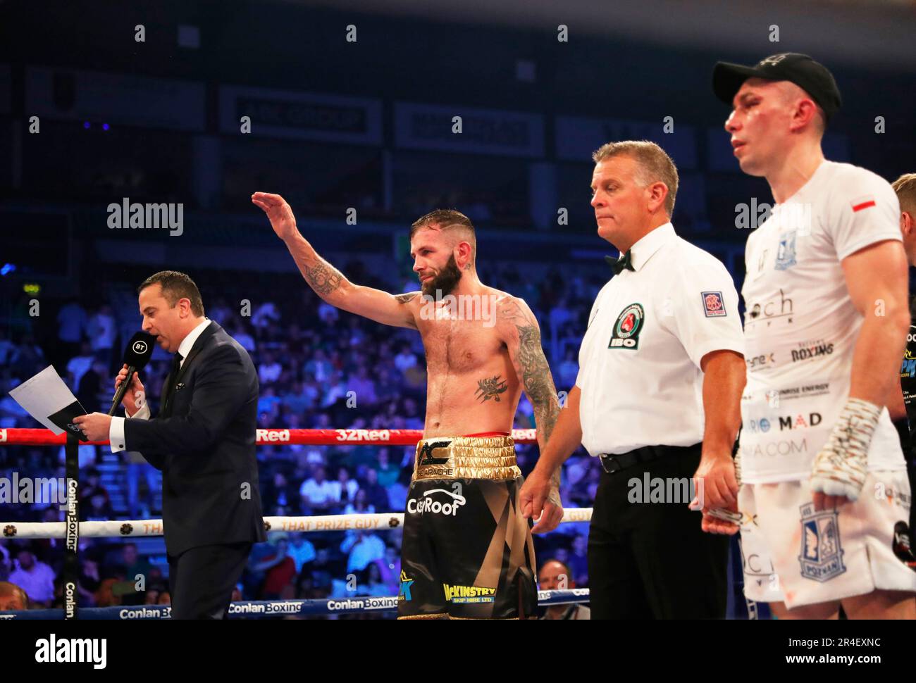 Anthony Cacace (left) after defeating Damian Wrzesinski to win the IBO ...
