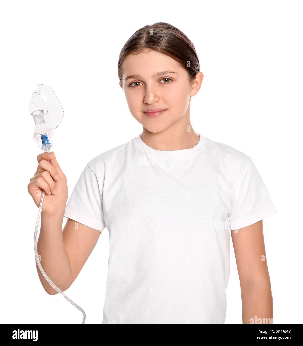 Cute girl holding nebulizer for inhalation on white background Stock ...