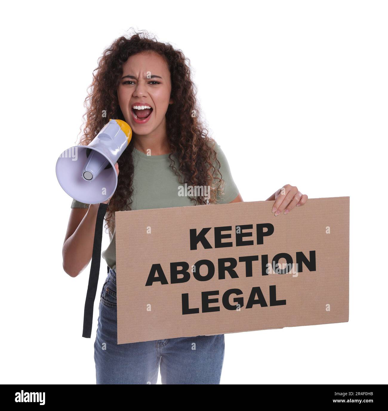 Emotional African American woman shouting into megaphone and holding ...