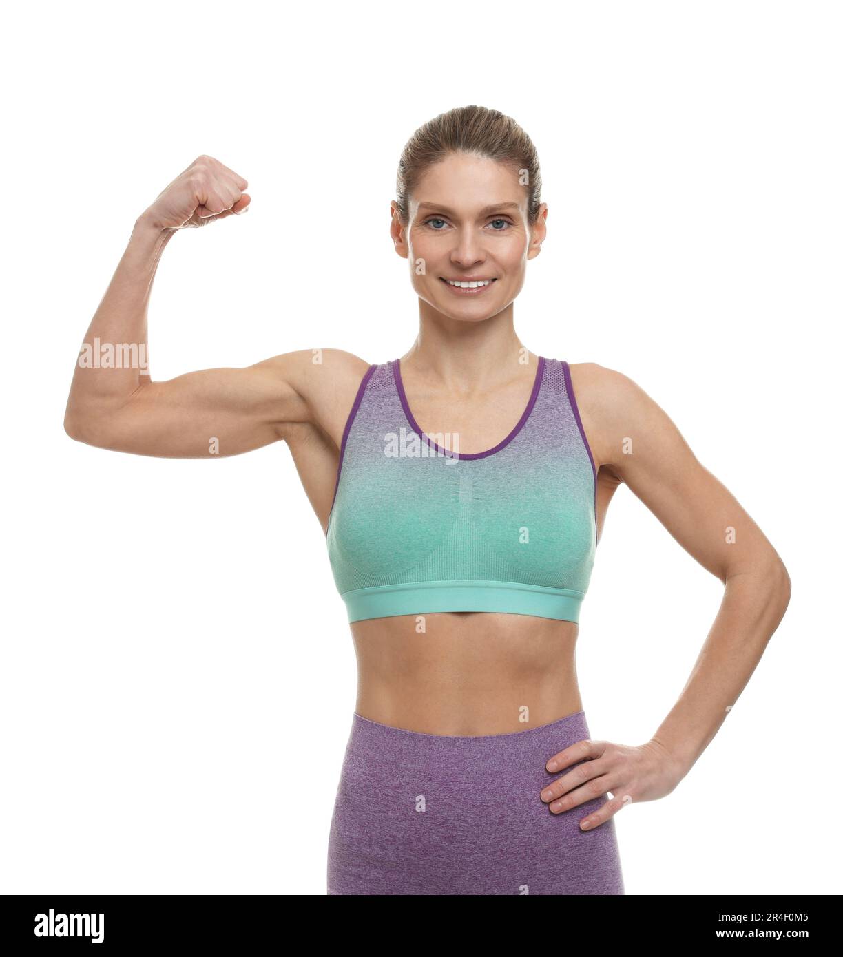 Woman bodybuilder showing muscles body hi-res stock photography and ...