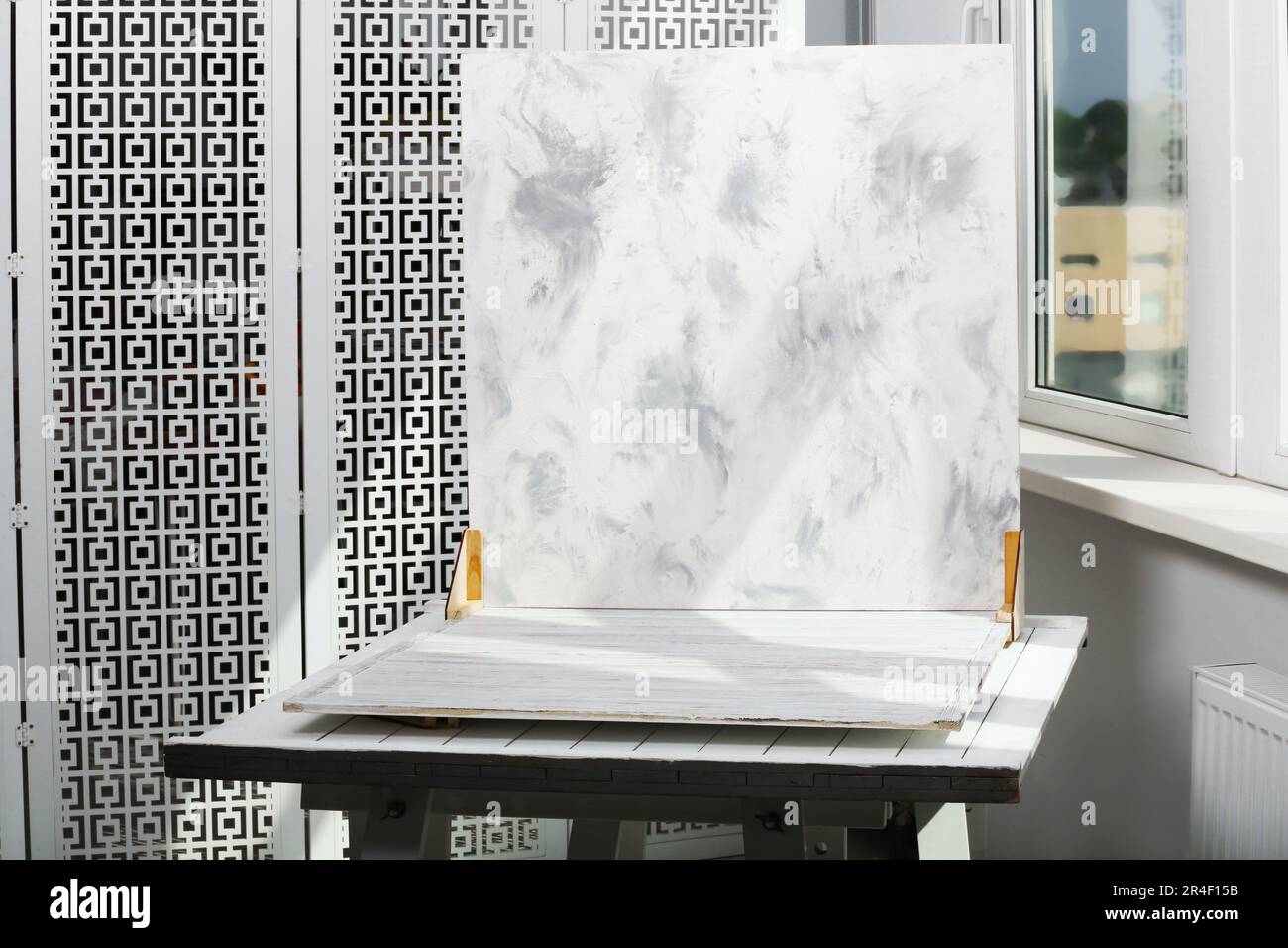 Double-sided backdrop on table in photo studio Stock Photo - Alamy