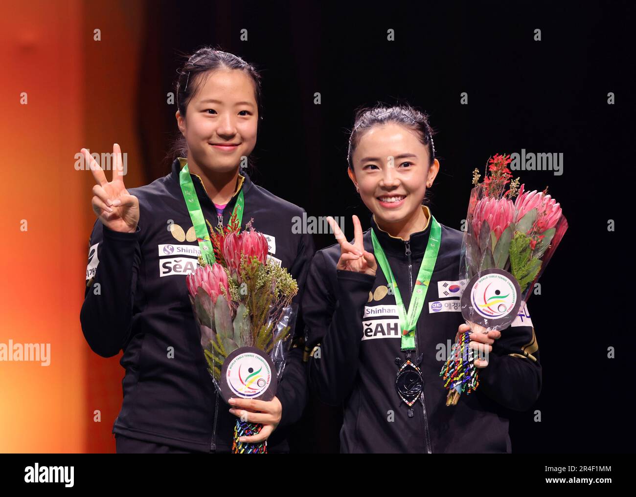 JEON Jihee and SHIN Yubin of South Korea celebrate during an award ...