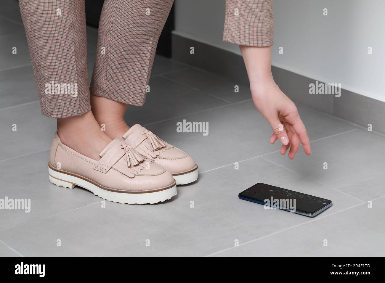 Phone cracked glass feet hi-res stock photography and images - Alamy
