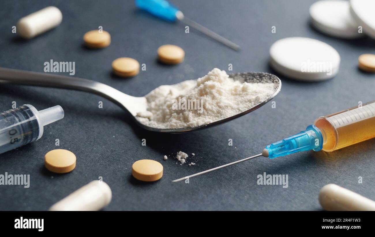 Different hard drugs on black background, closeup Stock Photo - Alamy