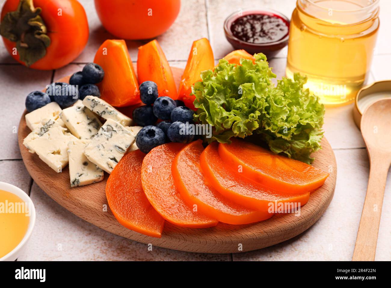 Delicious persimmon blue cheese hi-res stock photography and images - Alamy