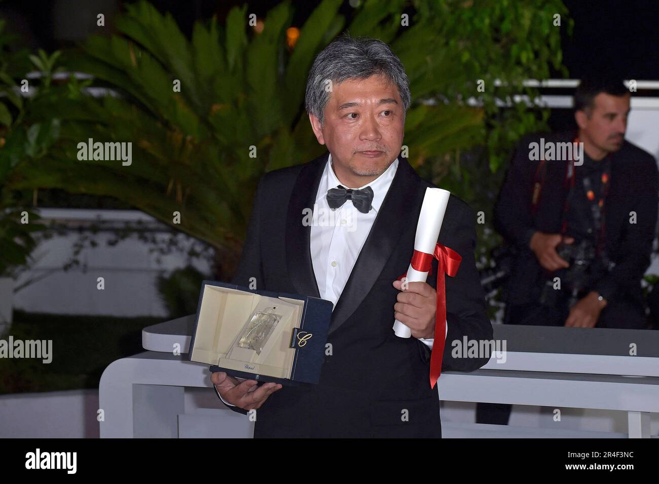 Cannes, France. 27th May, 2023. Hirokazu Koreeda holds the The Award ...