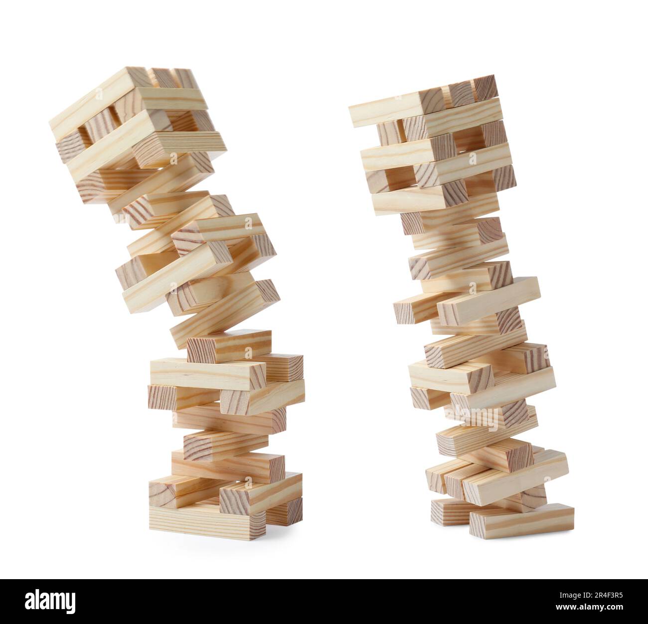 Jenga towers of wooden blocks falling on white background Stock Photo ...
