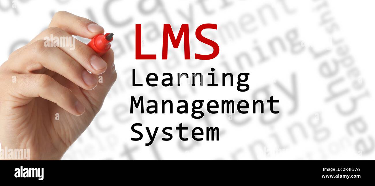 Learning management system. Woman writing abbreviation LMS on glass ...