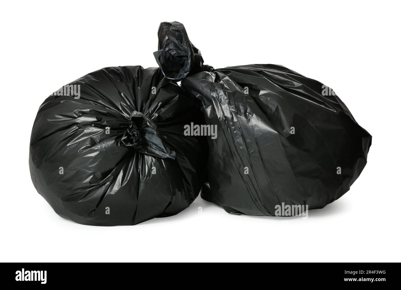 Trash bags full of garbage isolated on white Stock Photo - Alamy