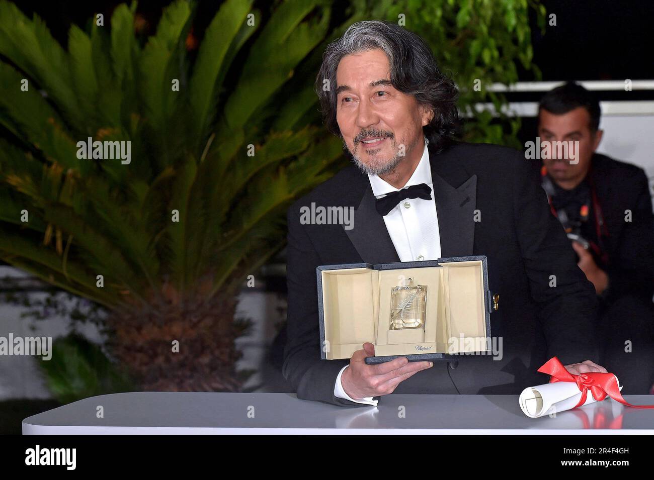Cannes, France. 27th May, 2023. Kōji Yakusho holds the Best Actor Award ...