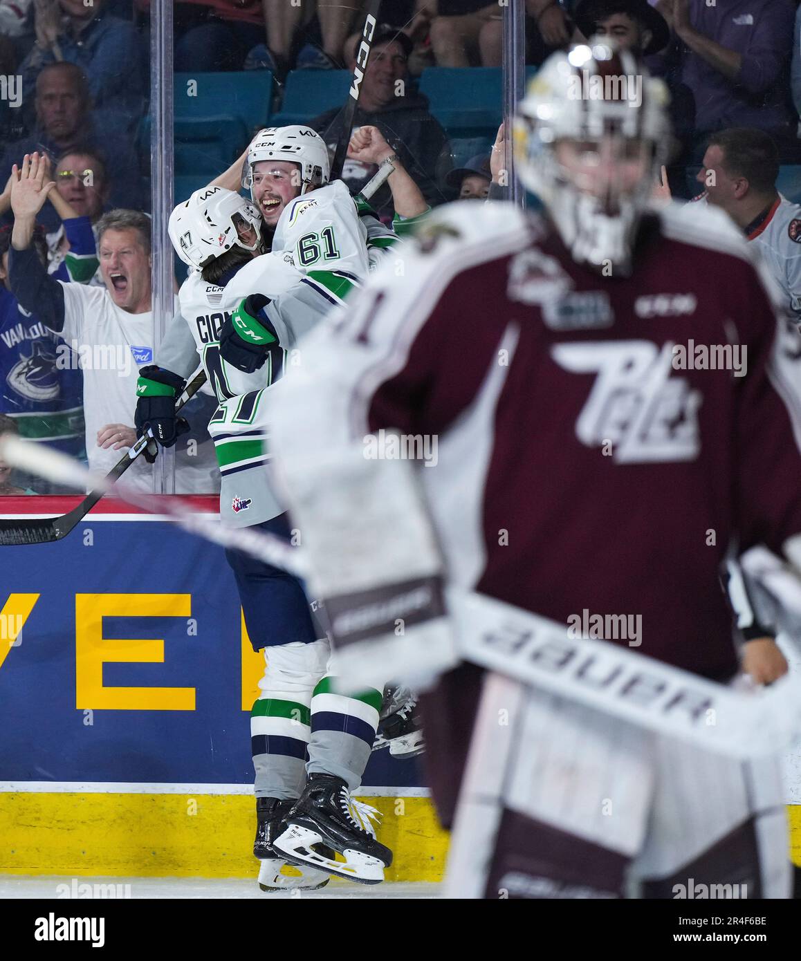 Seattle Thunderbirds' Kyle Crnkovic (61) and Lucas Ciona (47) celebrate after Crnkovic's second ...