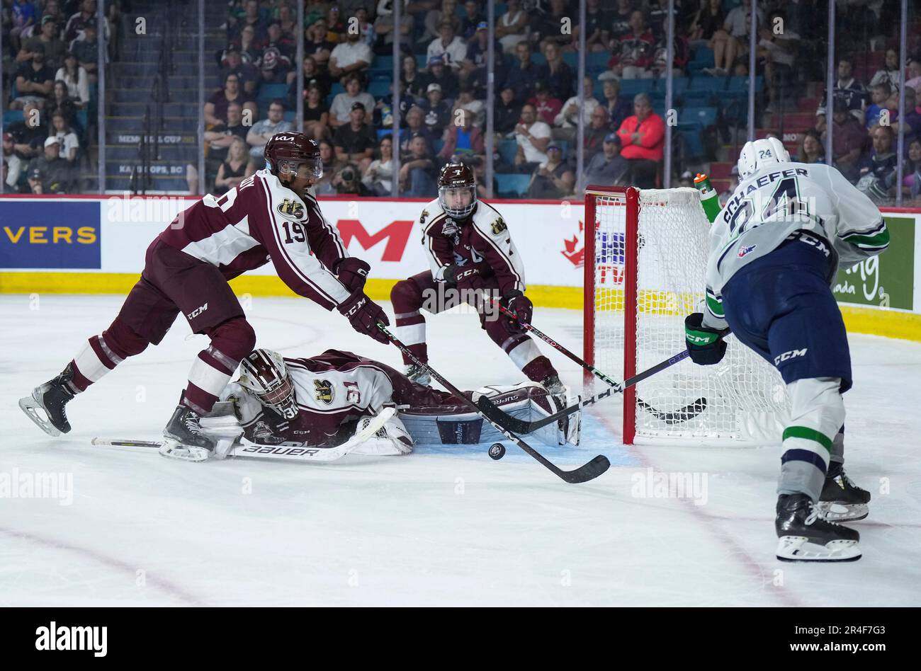Seattle Thunderbirds' Reid Schaefer (24) is stopped by Peterborough ...