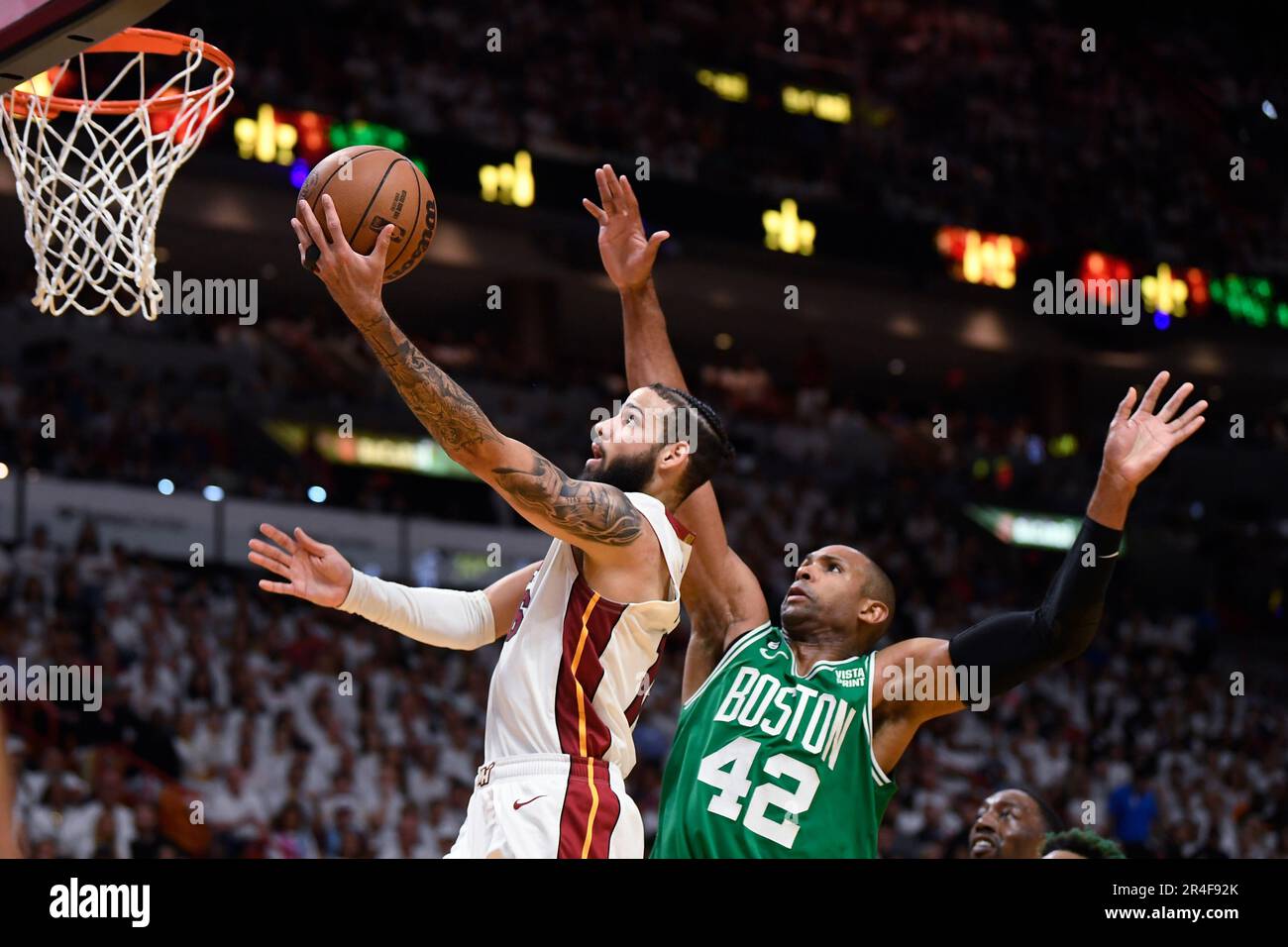 Miami Heat forward Caleb Martin goes up for a shot against Boston ...