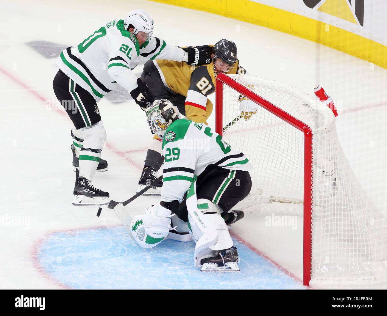 Dallas Stars goaltender Jake Oettinger (29) makes a block near Stars ...