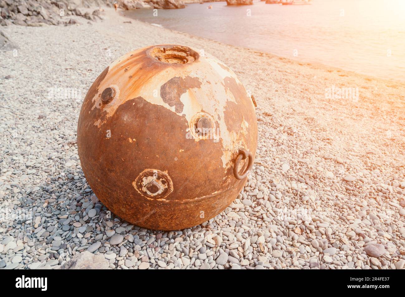 Old rusty sea mine on the beach Stock Photo - Alamy