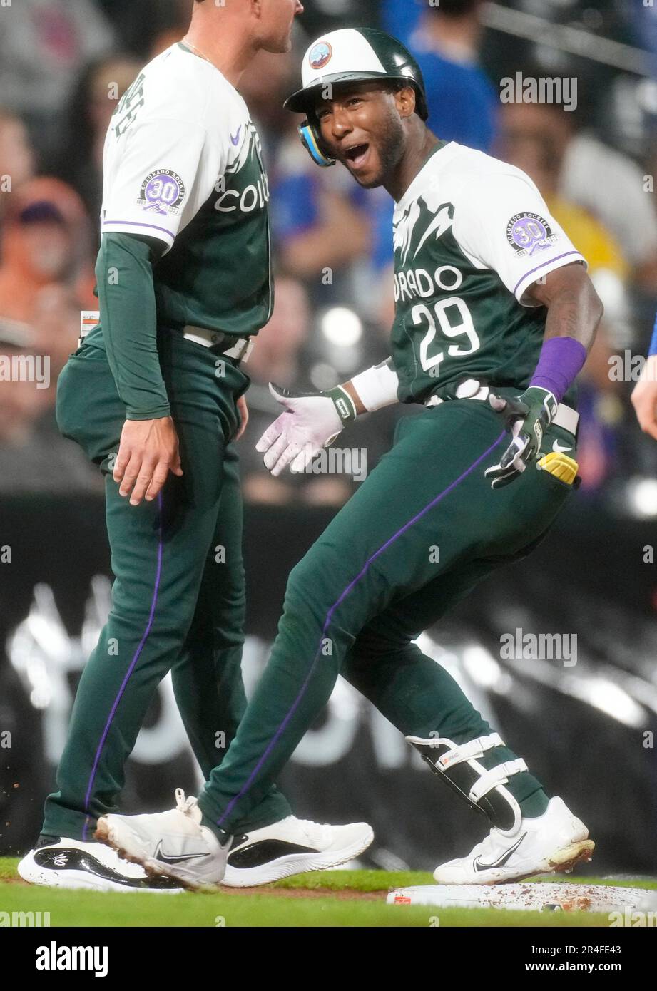 Colorado Rockies' Jurickson Profar celebrates after reaching third base ...