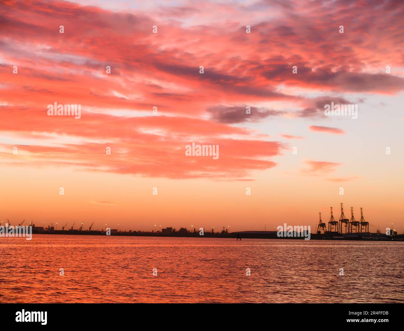 Impact of brilliant morning sunrise over Tauranga Harbour Stock Photo ...