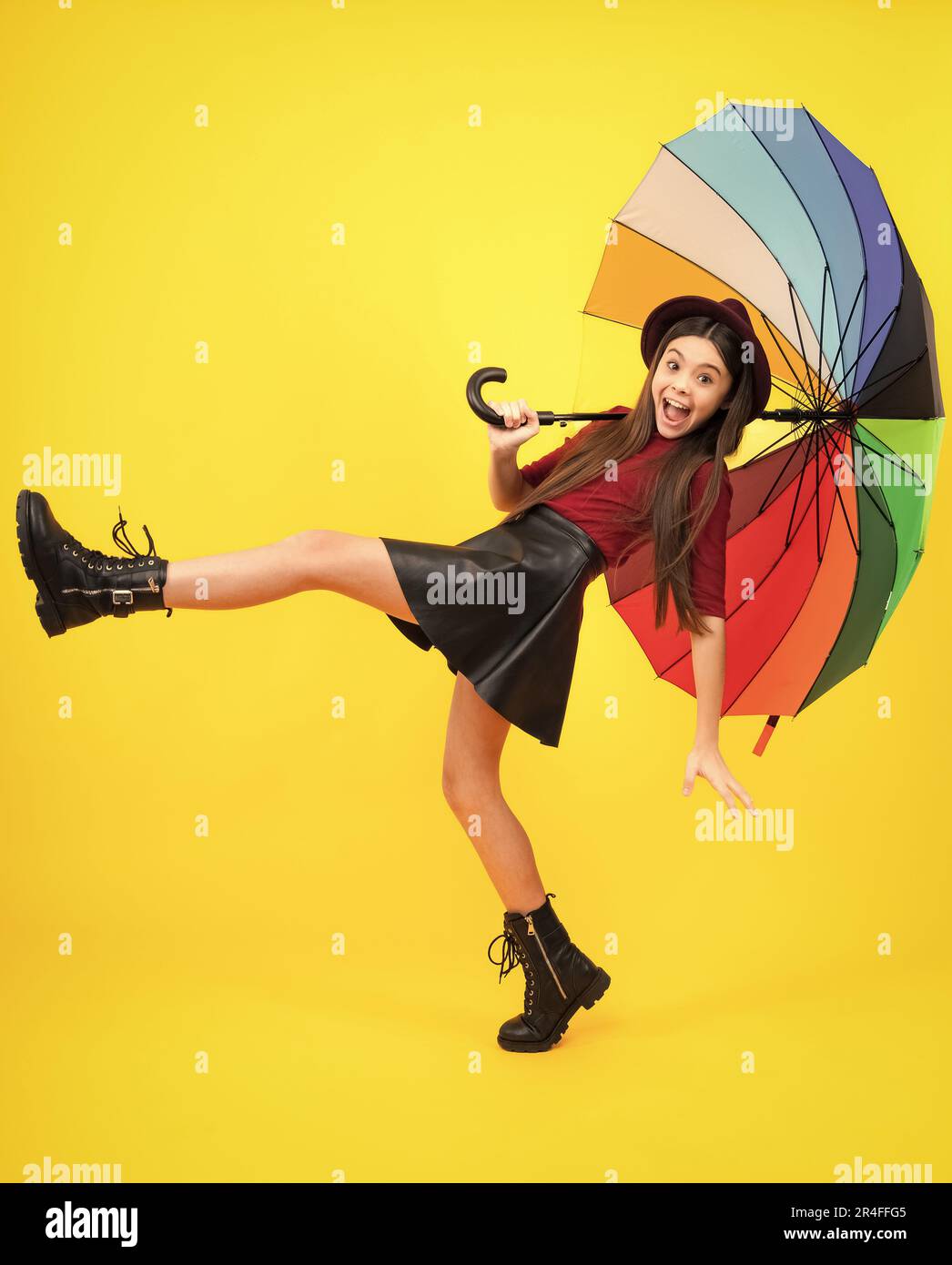 Child wuth umbrella under rain. Rainy weather, seasonal autumn. Excited ...