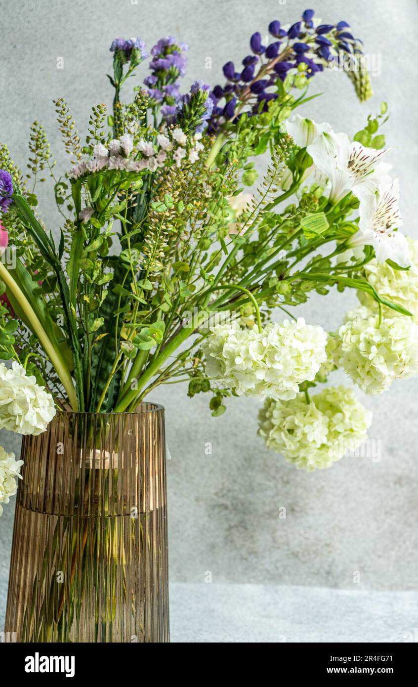Spring flower bouquet as a gift for holiday Stock Photo - Alamy