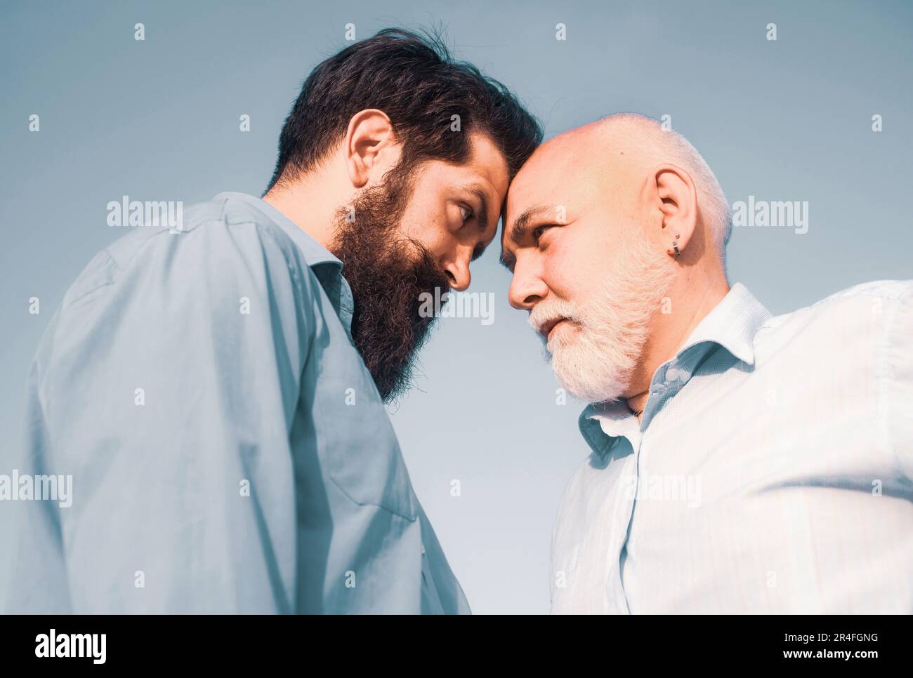 Grandpa retiree. Father and son relaxing together. Generation of people ...