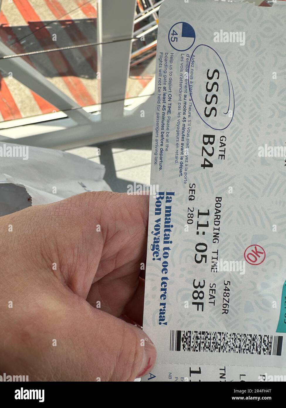 Paris, Paris, France. 25th May, 2023. Hand holding an airline ticket ...