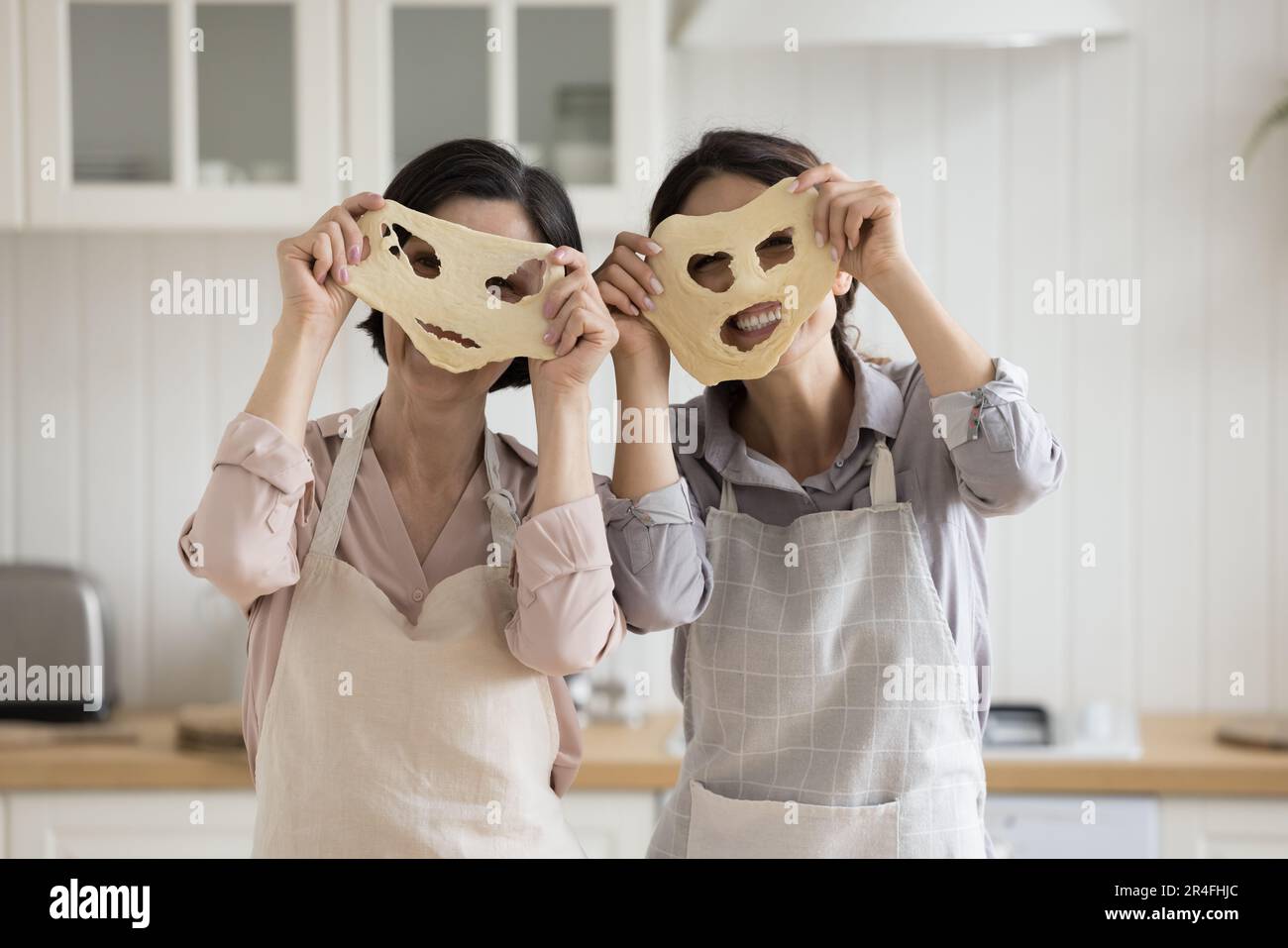 Young adult older adult mask dinner hi-res stock photography and images ...
