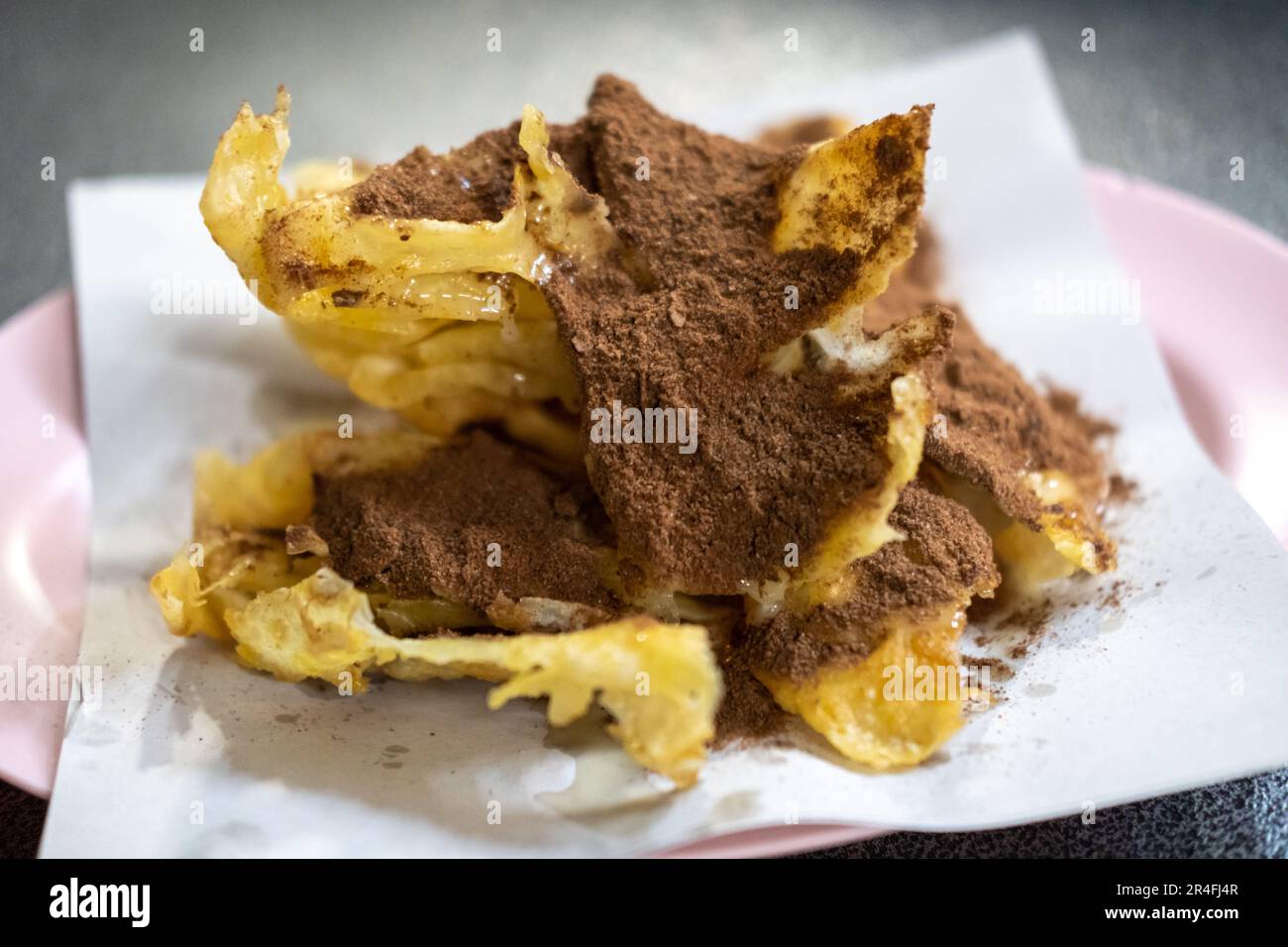 Crispy Roti with chocolate powder, served on plate Stock Photo - Alamy