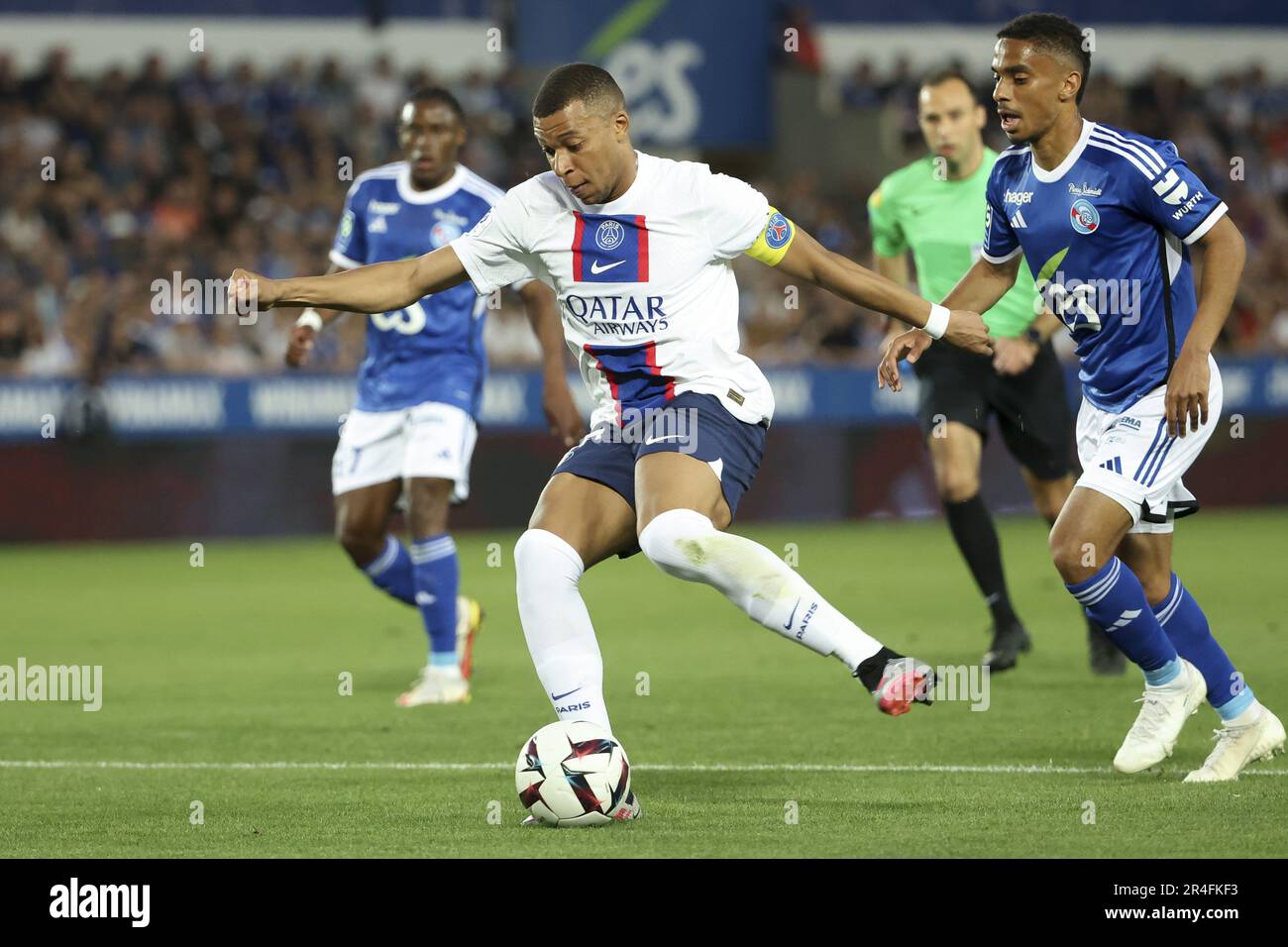 Kylian Mbappe of PSG, Colin Dagba of Strasbourg during the French ...