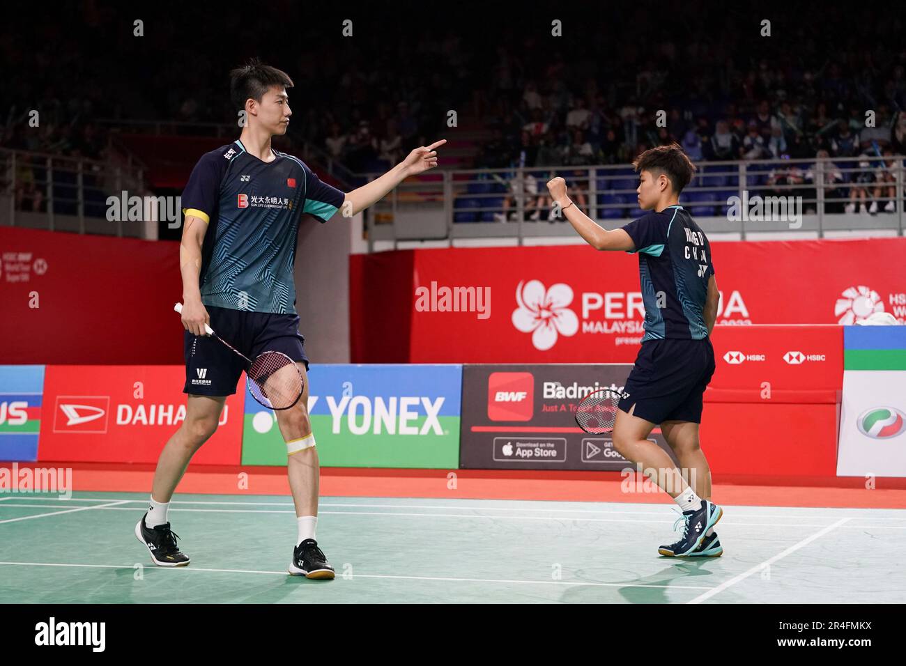 China's Huang Dong Ping, right and Feng Yan Zhe react after scoring a ...