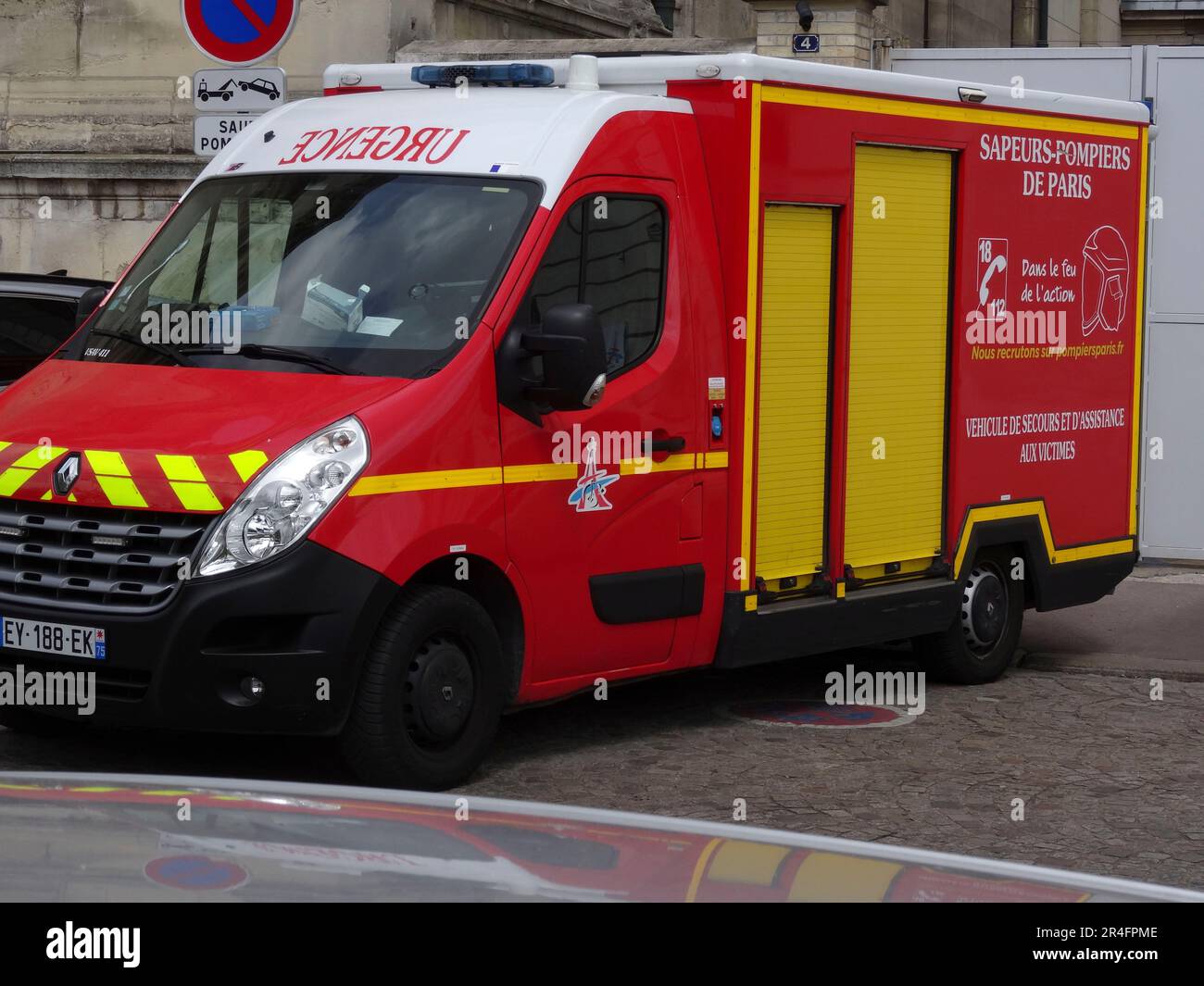 Red Paris emergency vehicle leaving home station, Paris, France, Europe ...