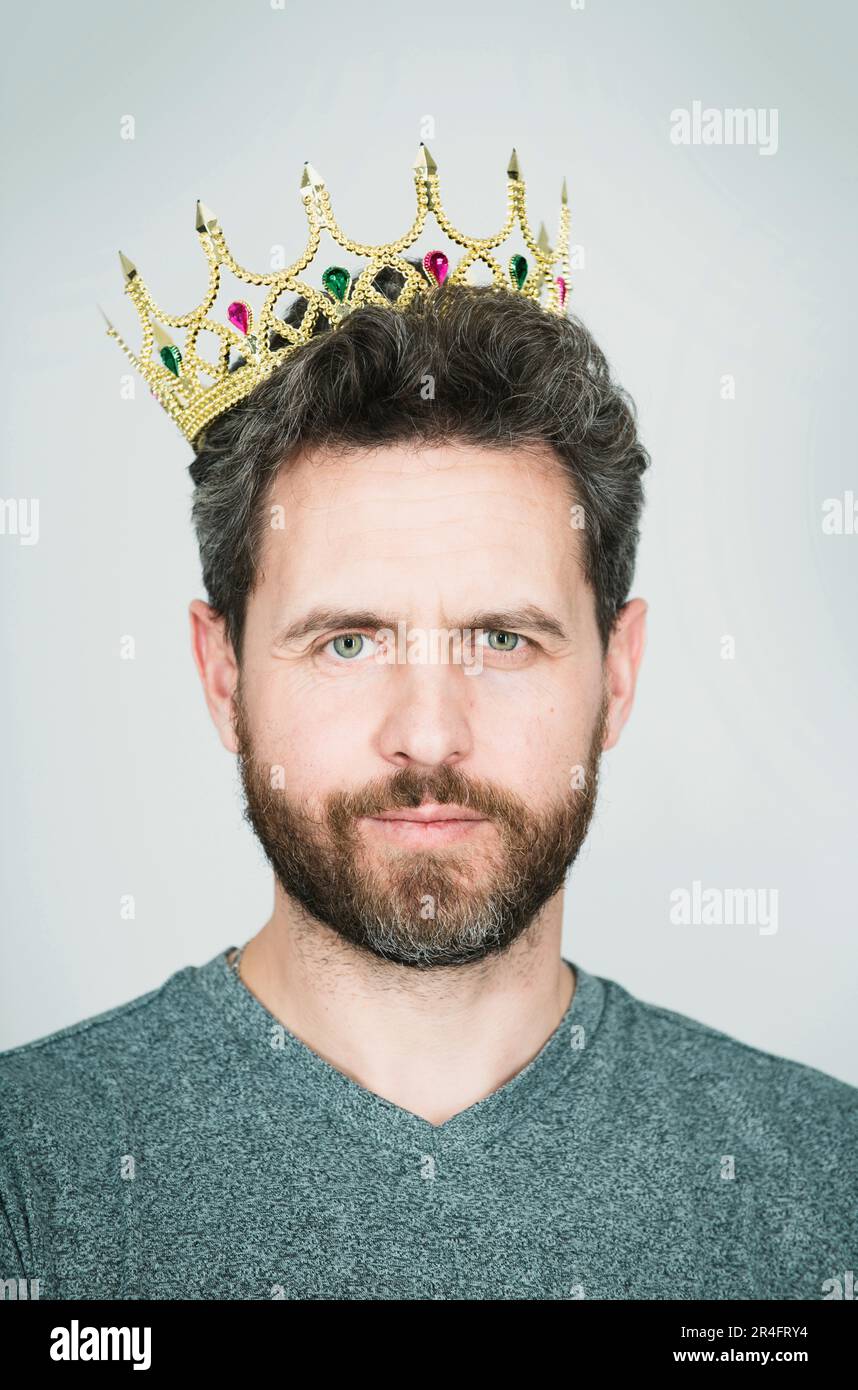 Young Man With Golden Crown Of King Over Gray Background Handsome Successful Man Wearing King