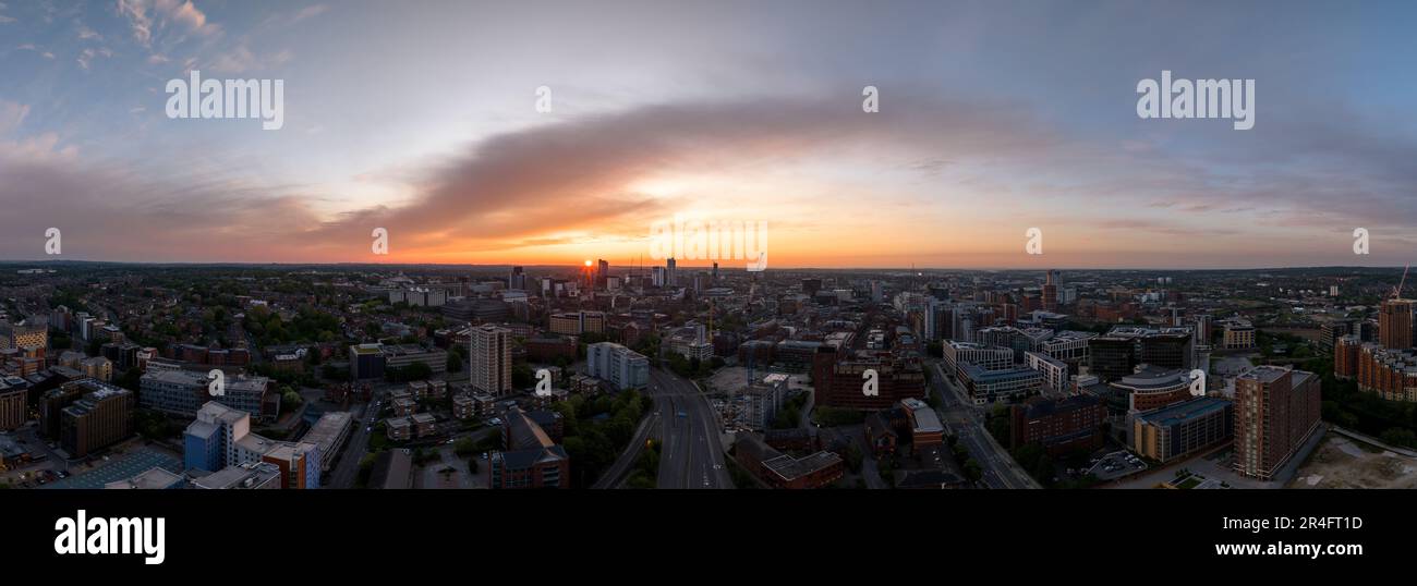 A mesmerizing view of Leeds city skyline illuminated at night, its tall ...