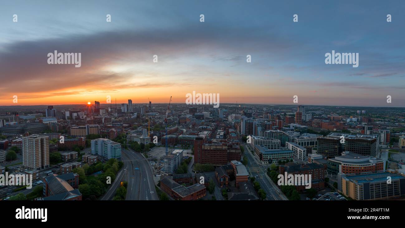A mesmerizing view of Leeds city skyline illuminated at night, its tall ...