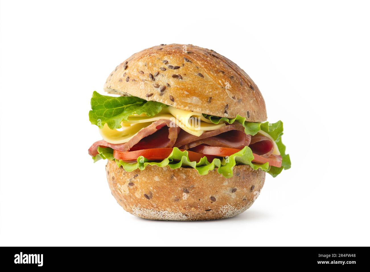 Sandwich with meat, cheese and vegetables isolated on a white ...