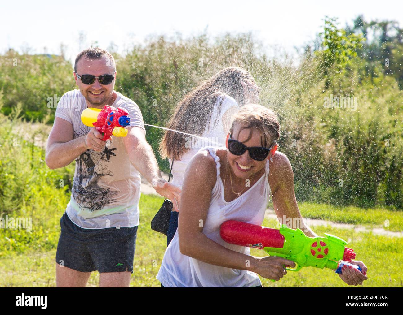 Children playing Water battle, water game battle Stock Photo - Alamy